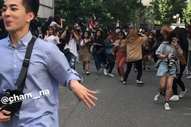Pic of EXO’s Xiumin running away from his fansites is both hilarious ...